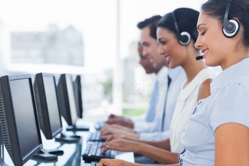 Call Centre Workers Working In Line Stock Photo - Image of staff ...