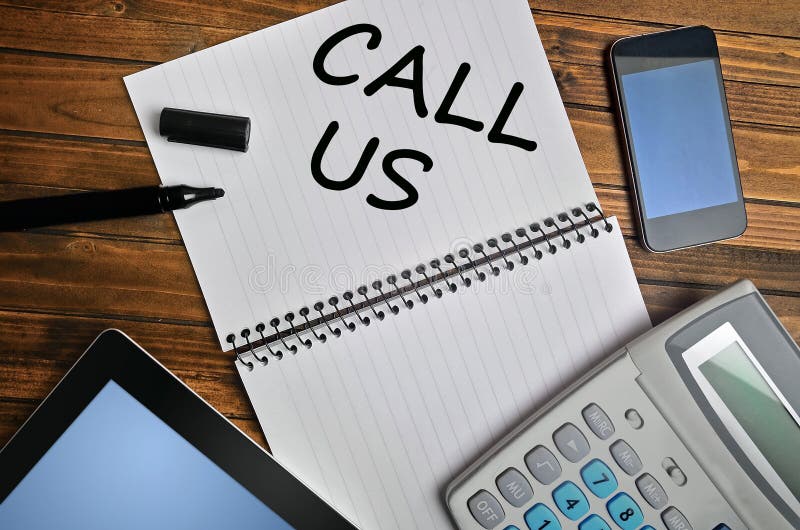 Call Us words on notebook stock photo. Image of communicate - 69491888