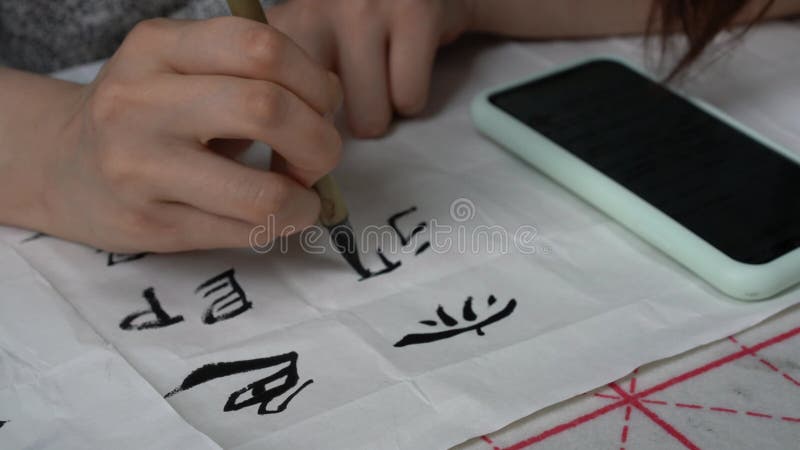 A Calligrapher is Creating Calligraphy and Writing Calligraphy Stock ...