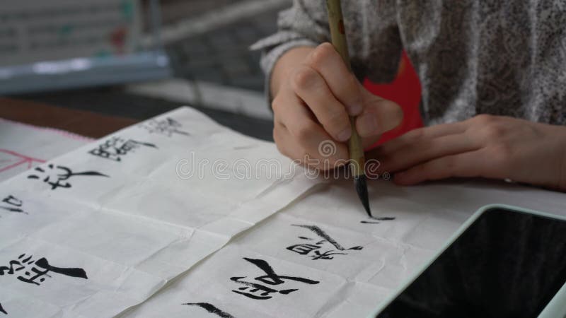 A Calligrapher is Creating Calligraphy and Writing Calligraphy Stock ...