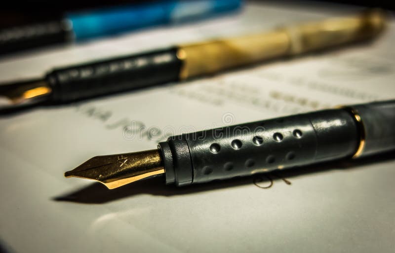 Two pens for calligraphy stock image. Image of golden - 17043541