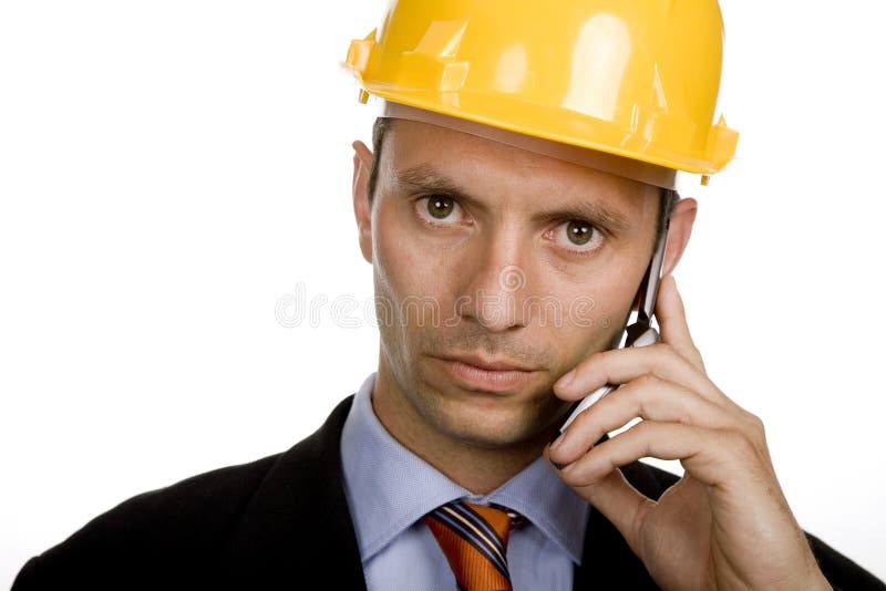 Engineer with cellphone stock photo. Image of person, isolated - 943056