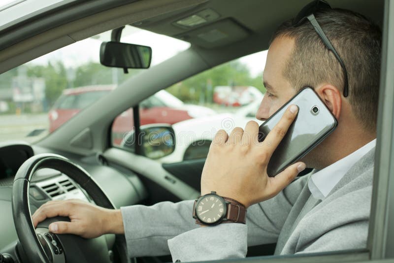Driving with a Mobile Phone in Hand Stock Photo - Image of horizontal ...