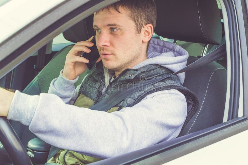 Calling by Driving. Risky Driver Using Phone while Driving Stock Photo ...