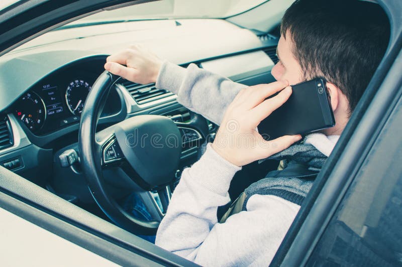 Calling by Driving. Risky Driver Using Phone while Driving Stock Photo ...