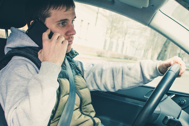 Calling by Driving. Risky Driver Using Phone while Driving Stock Photo ...
