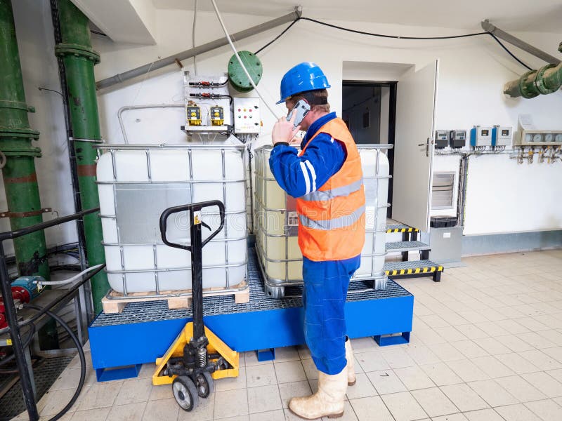 Calling Worker. Industrial Engineer Using Phone in Industry Room Stock ...