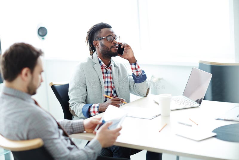 Calling at workplace stock photo. Image of cellphone - 70540752