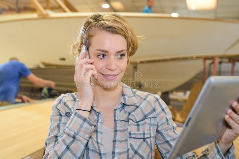 Calling from the workshop stock image. Image of contact - 118900253