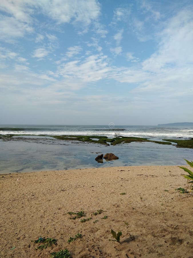 A calm beach to relax stock photo. Image of coast, beach - 268624278