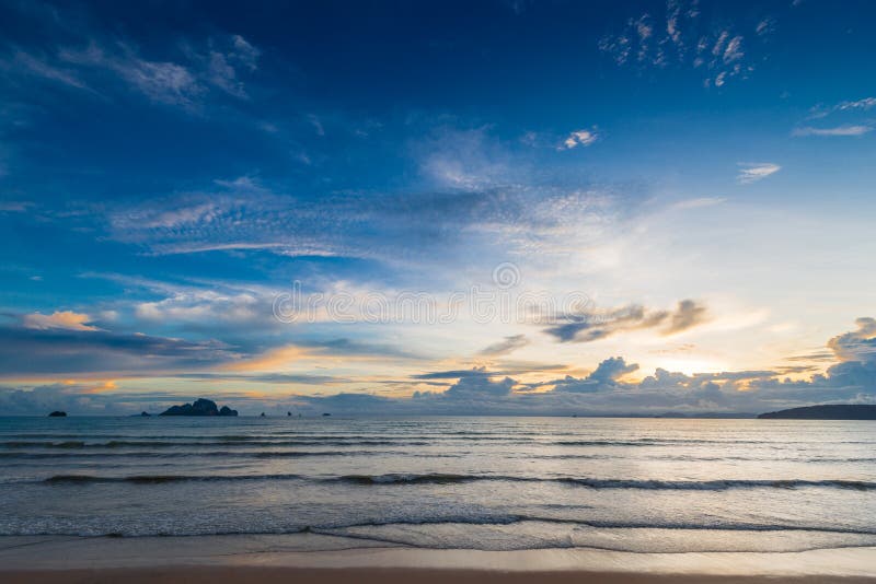 Calm Beautiful Sea and Setting Sun in the Clouds Stock Image - Image of ...