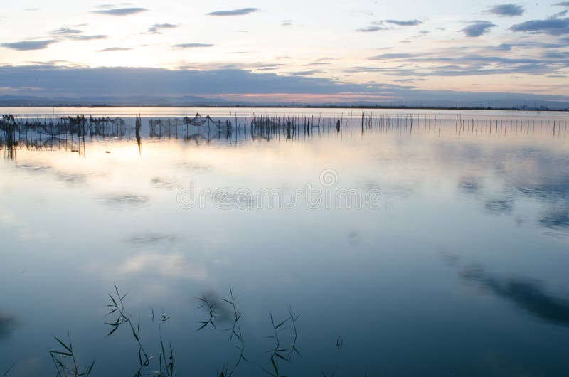 Calm Blue Lake in a Cloudy Day Stock Image - Image of europe, nice ...