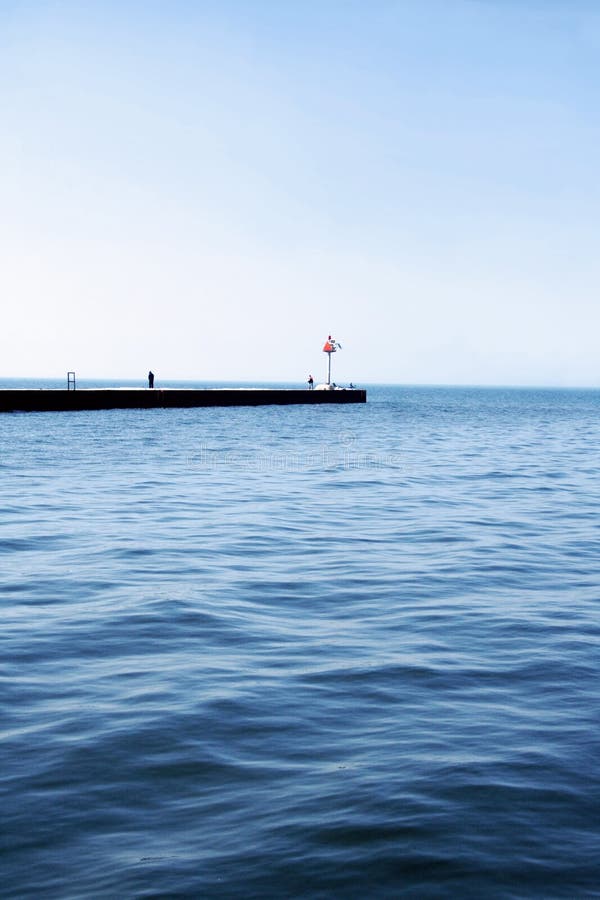 Calm Blue Water stock photo. Image of current, pier, light - 996042