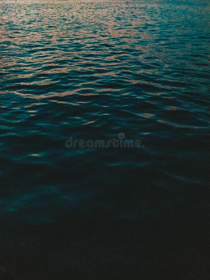Calm Blue Waves stock image. Image of lonely, sunset - 209275449
