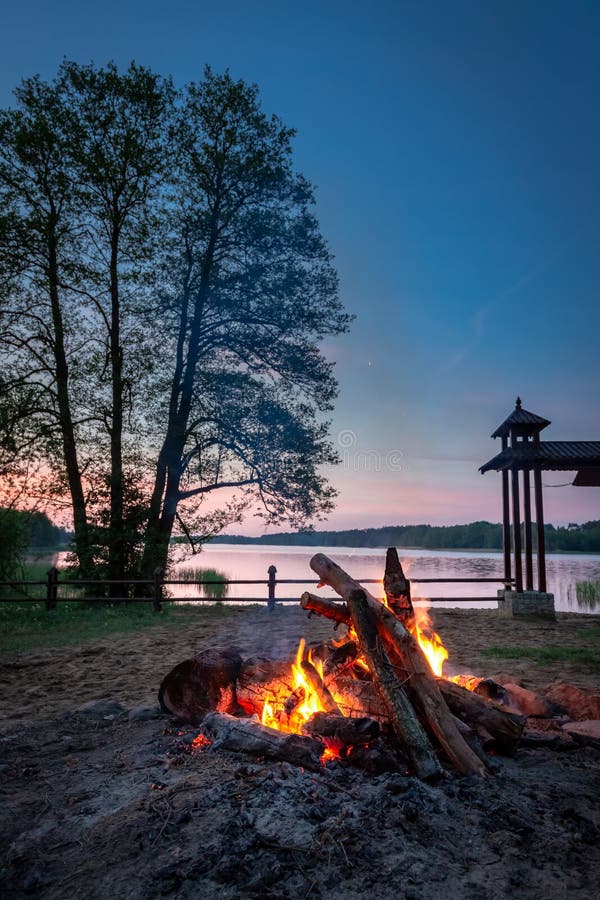 Calm Bonfire at Dusk by the Lake in Summer Stock Image - Image of ...
