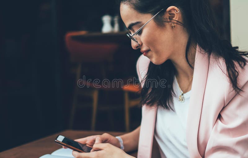 Calm Ethnic Lady Watching Smartphone Relaxing in Cafe Stock Photo ...