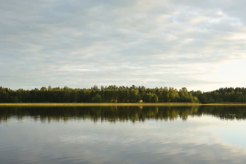 Calm evening by the lake. stock image. Image of hipster - 76289699