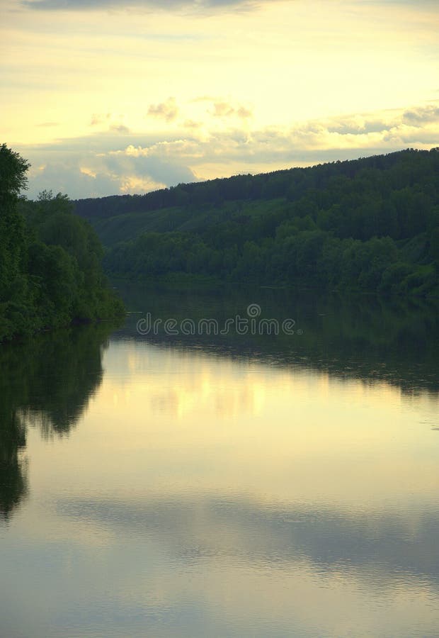 Calm Flow of the River at the Side of a Hill, Shot at Sunset. Landscape ...