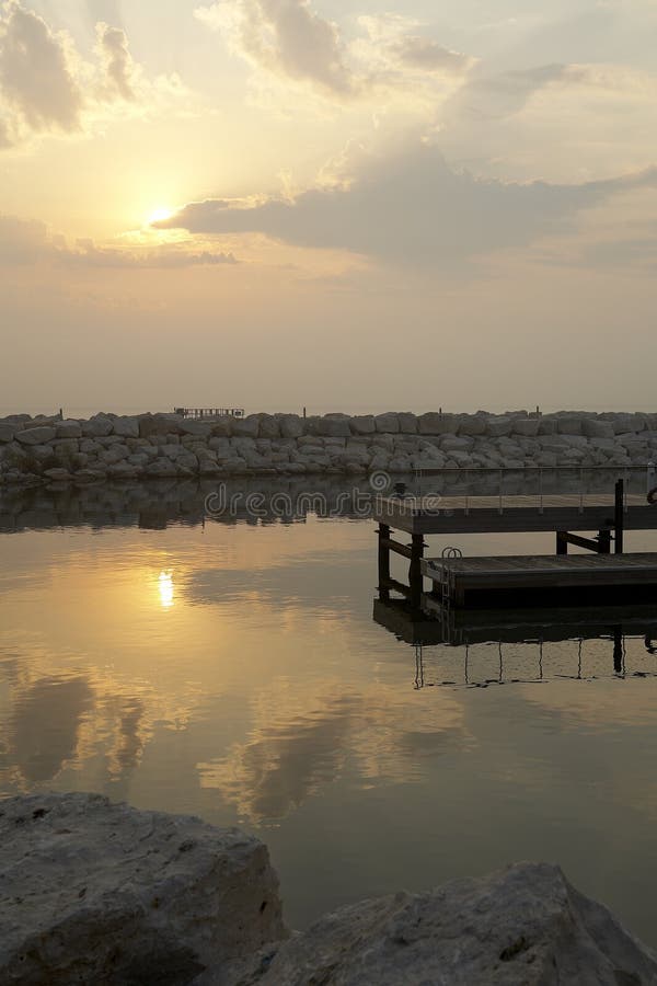 Calm harbor at sunrise stock image. Image of dock, waterfront - 13024499