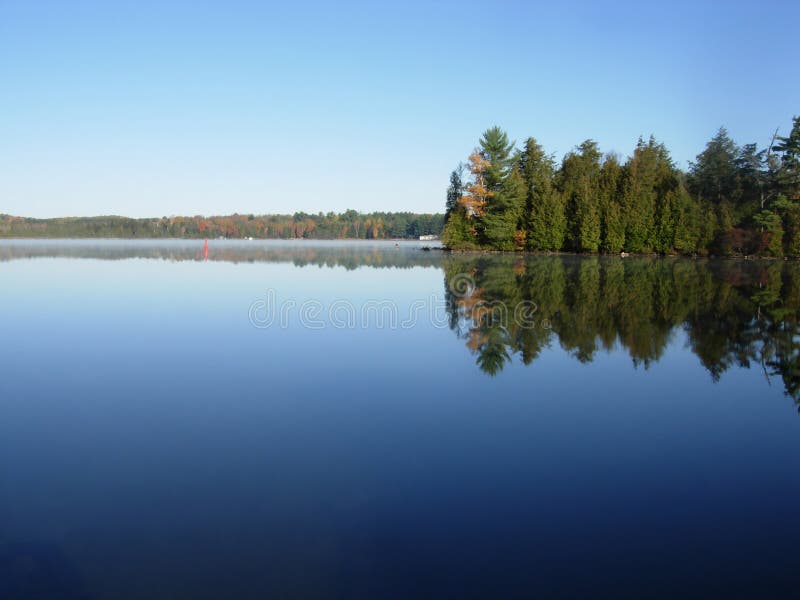Calm Lake stock photo. Image of outdoors, nature, foliage - 1413764