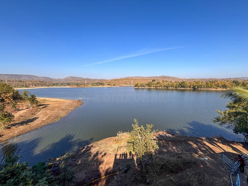 A Calm Lake with a Blue Sky in the Background Stock Image - Image of ...
