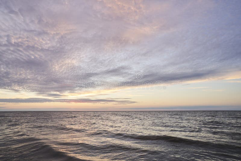 Calm Lake Eire Waves stock image. Image of purple, madison - 265364353