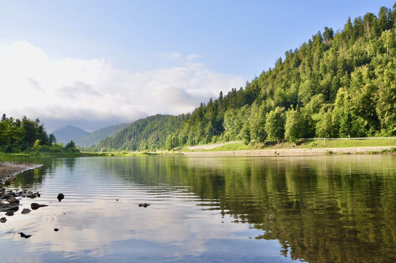 Calm Lake in the Mountain with Tree Reflection on Water Surface Stock ...