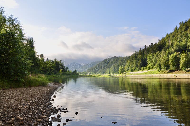 Calm Lake in the Mountain with Tree Reflection on Water Surface Stock ...