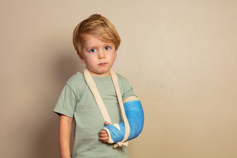 Calm Little Blond Boy Having Broken Hand in Cast Stock Photo - Image of ...