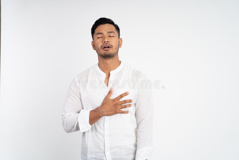 Calm Man with Chest Hands while Feeling Comfortable and Relieved Stock ...