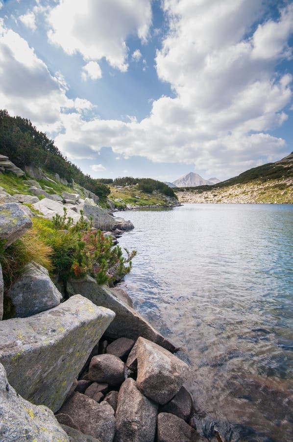 Calm Mountain Lake and Stones Stock Photo - Image of blue, high: 26244420
