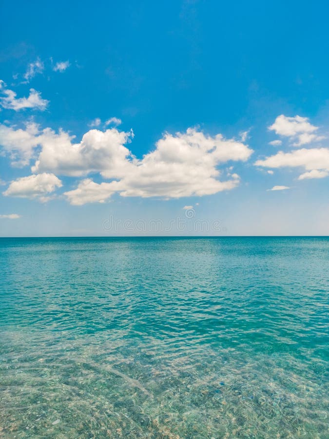 Calm Ocean Horizon with Clouds Stock Image - Image of crystalline ...