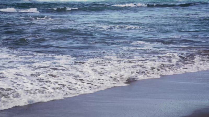 Calm Ocean Waves Breaking Gently on the Shore, Captured from a Static ...
