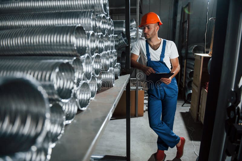 Calm and Quiet. Man in Uniform Works on the Production Stock Image ...