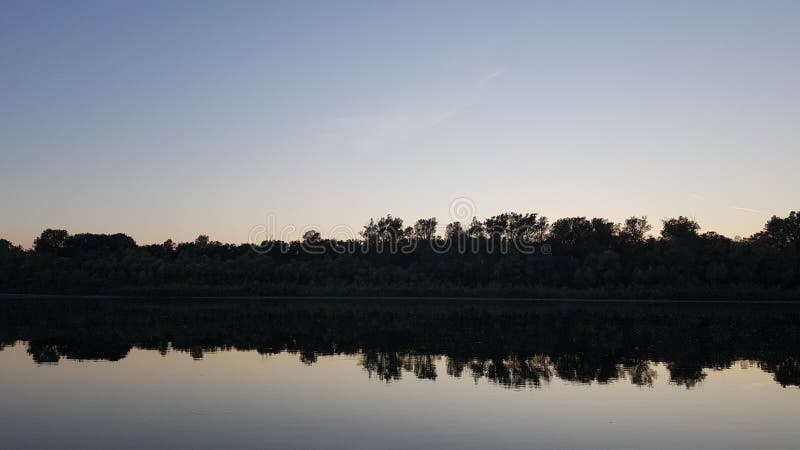 Calm River Surface and Perfect Gradient of Sunset Stock Photo - Image ...