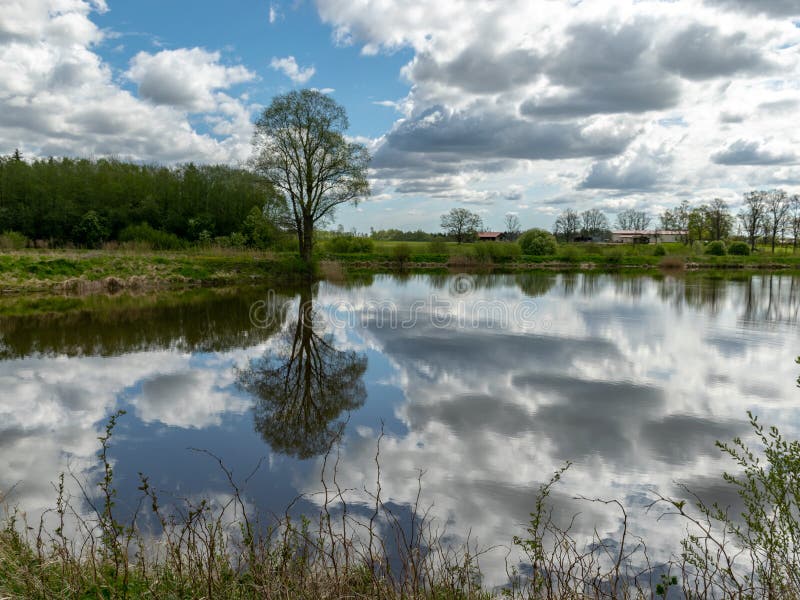 Calm Scene of Beautiful Sky with Cumulus Clouds Reflection on the Lake ...