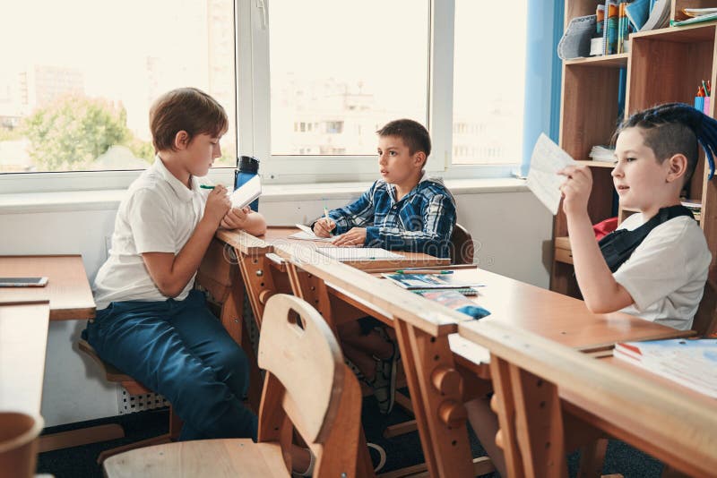 Calm Schoolchildren Studying in Modern Comfortable Classroom Stock ...