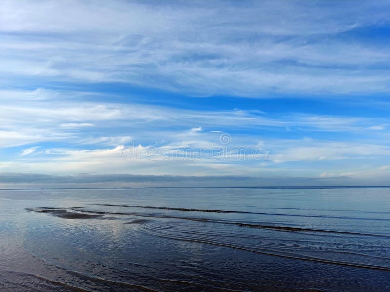 Calm Sea and Blue Sky with Fluffy White Clouds Stock Photo - Image of ...