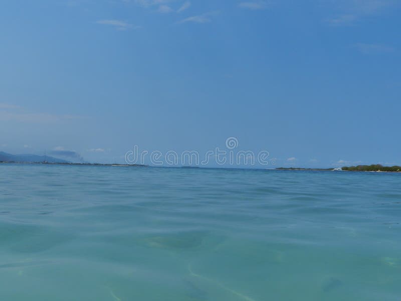 Calm Sea with a Clear Blue Sky Background Stock Image - Image of ...