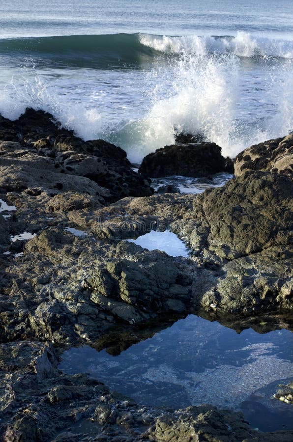 Calm Sea Rock and Powerful Waves Stock Photo - Image of stone, motion ...