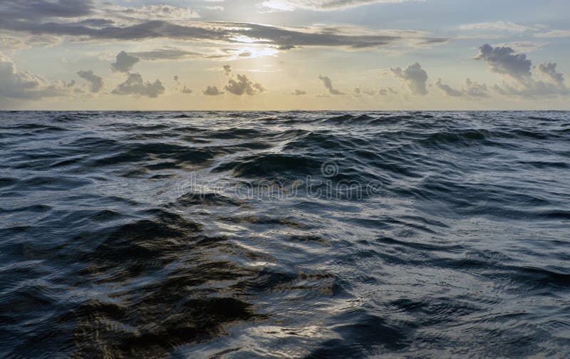 Calm Sea, Sun Setting, Light Waves. Stock Image - Image of bouncing ...