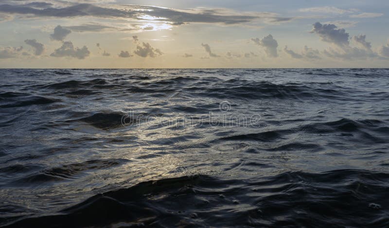 Calm Sea, Sun Setting, Light Waves. Stock Image - Image of waves ...