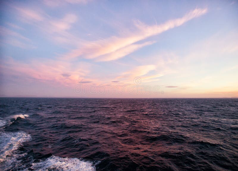 Calm sea stock photo. Image of orange, sunset, sitting - 66925202