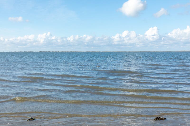 Calm Sea Under the Cloudy Sky on the Border of Germany Stock Photo ...