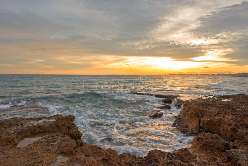 The Calm Sea in a Very Cloudy Sunset Stock Photo - Image of costa ...