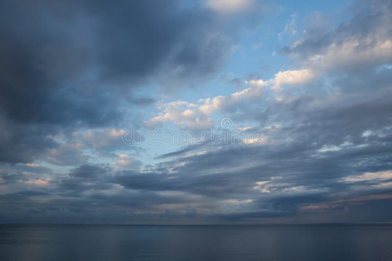 Calm sea view stock image. Image of dusk, clouds, seascape - 96912955