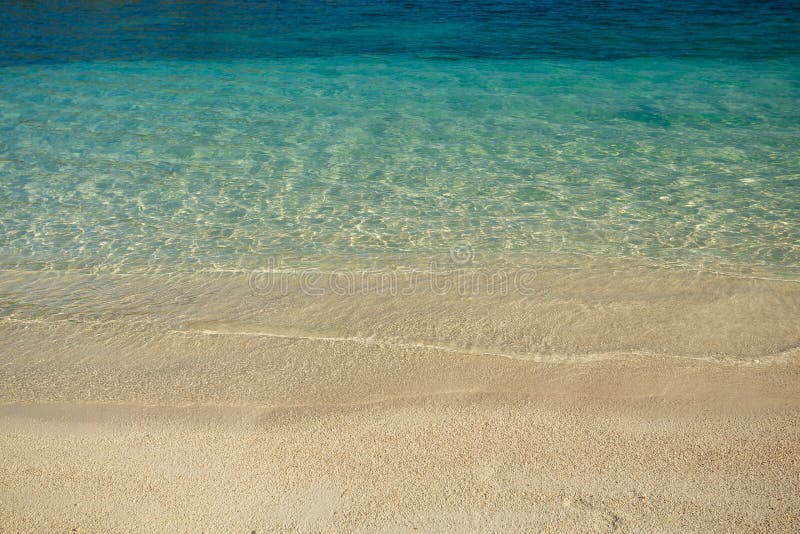 Calm sea waves on sand stock photo. Image of vacation - 152301672