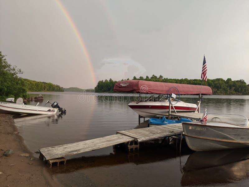 Calm after the Storm Rainbow Editorial Photo - Image of lake, ship ...