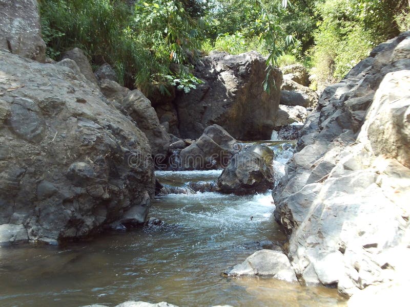 Calm Stream River Water through Large Rock Gaps on Either Side Stock ...