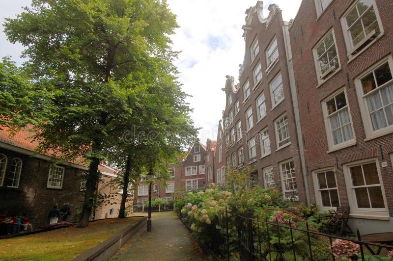 Calm street in Amsterdam stock image. Image of cathedral - 12538129